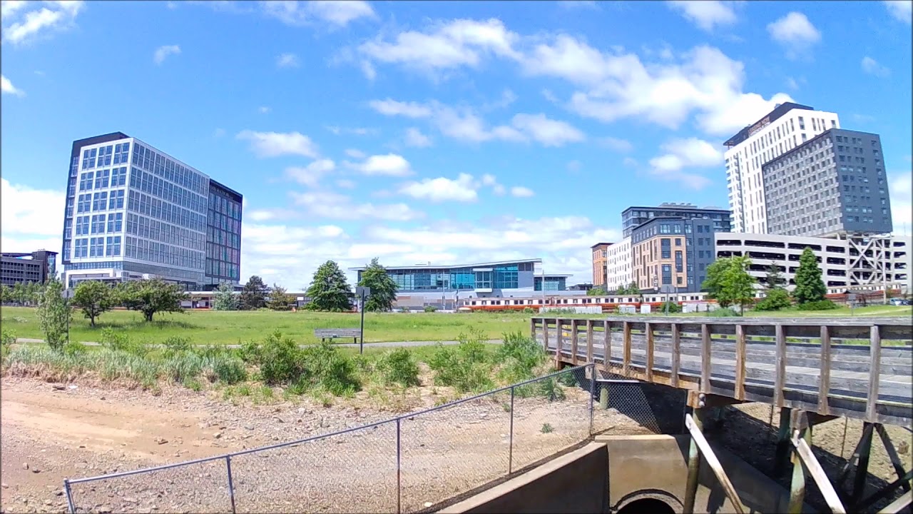 Orange Line Trains at Assembly Station and MBTA #1122 inbound to Boston ...