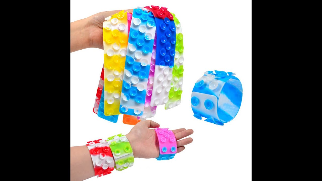 Silicone suction cup squidopop silicone Velcro - YouTube