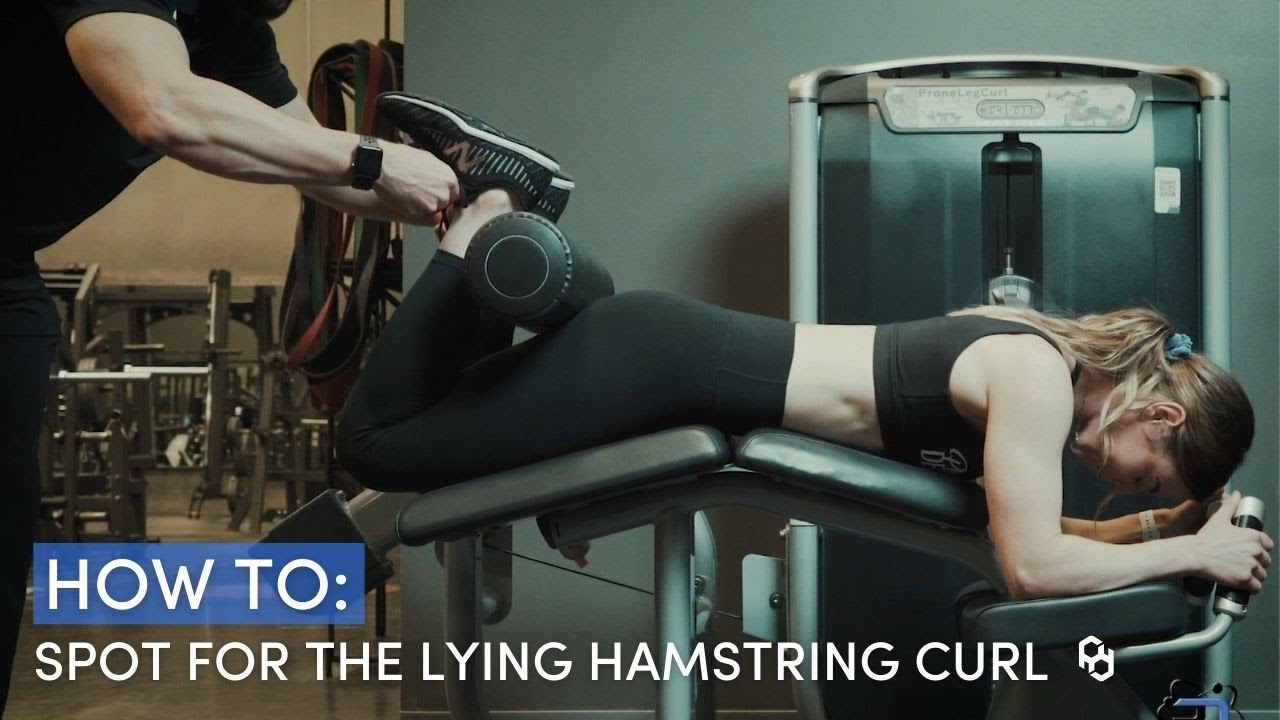 How To: Spot for the Lying Hamstring Curl - YouTube