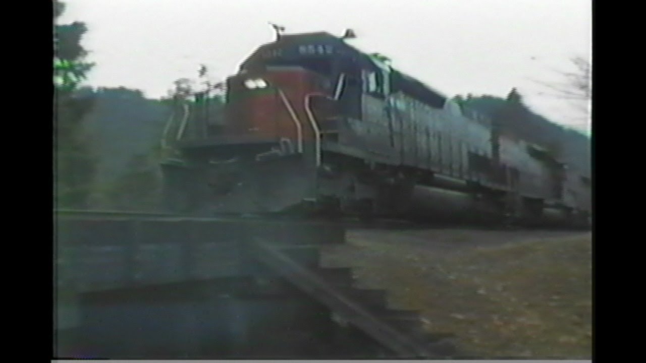 1039. 13 SOUTHERN PACIFIC SP 8542 Medford hauler at little bridge ...