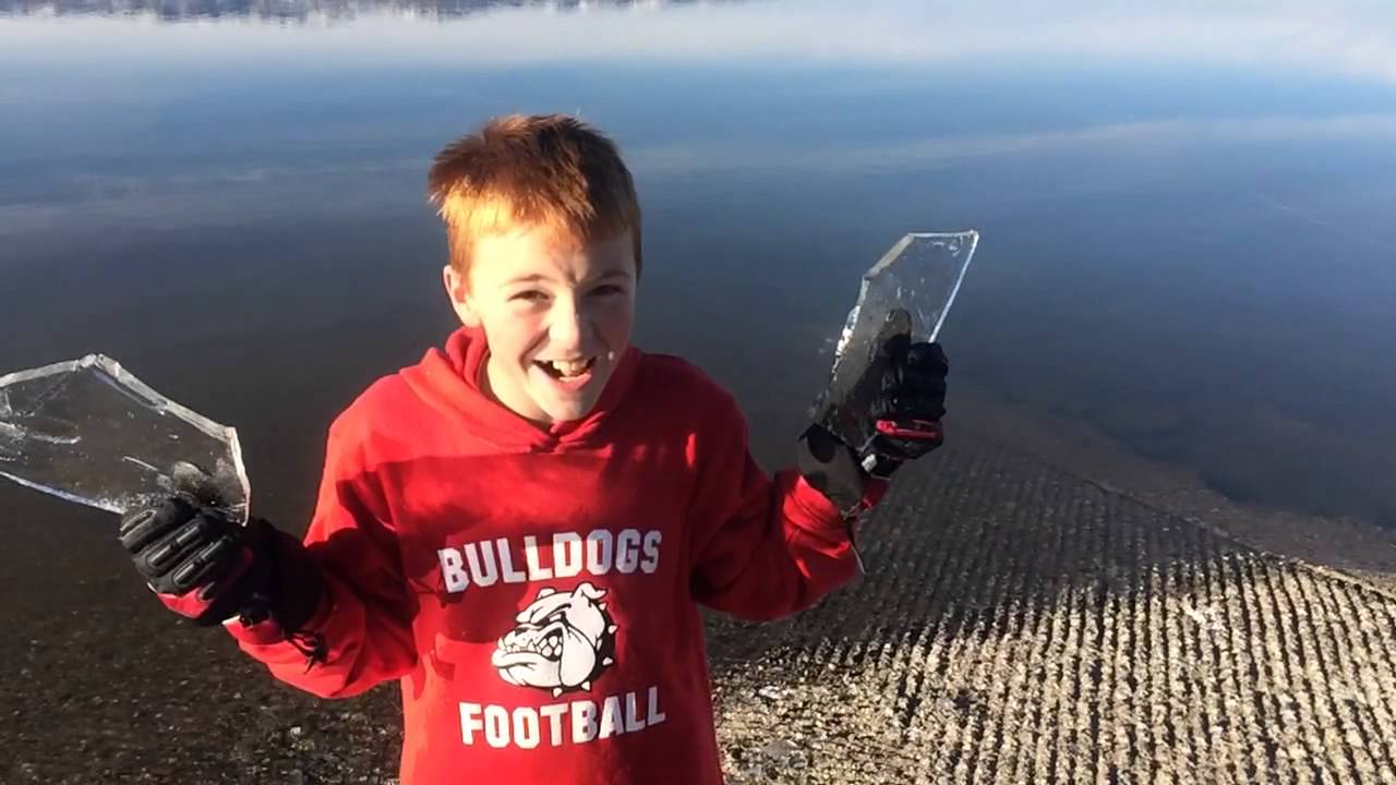 Breaking a thick slab of ice over his head! Slow motion. - YouTube