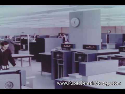 Employees working in early computer office 1950's archival footage ...