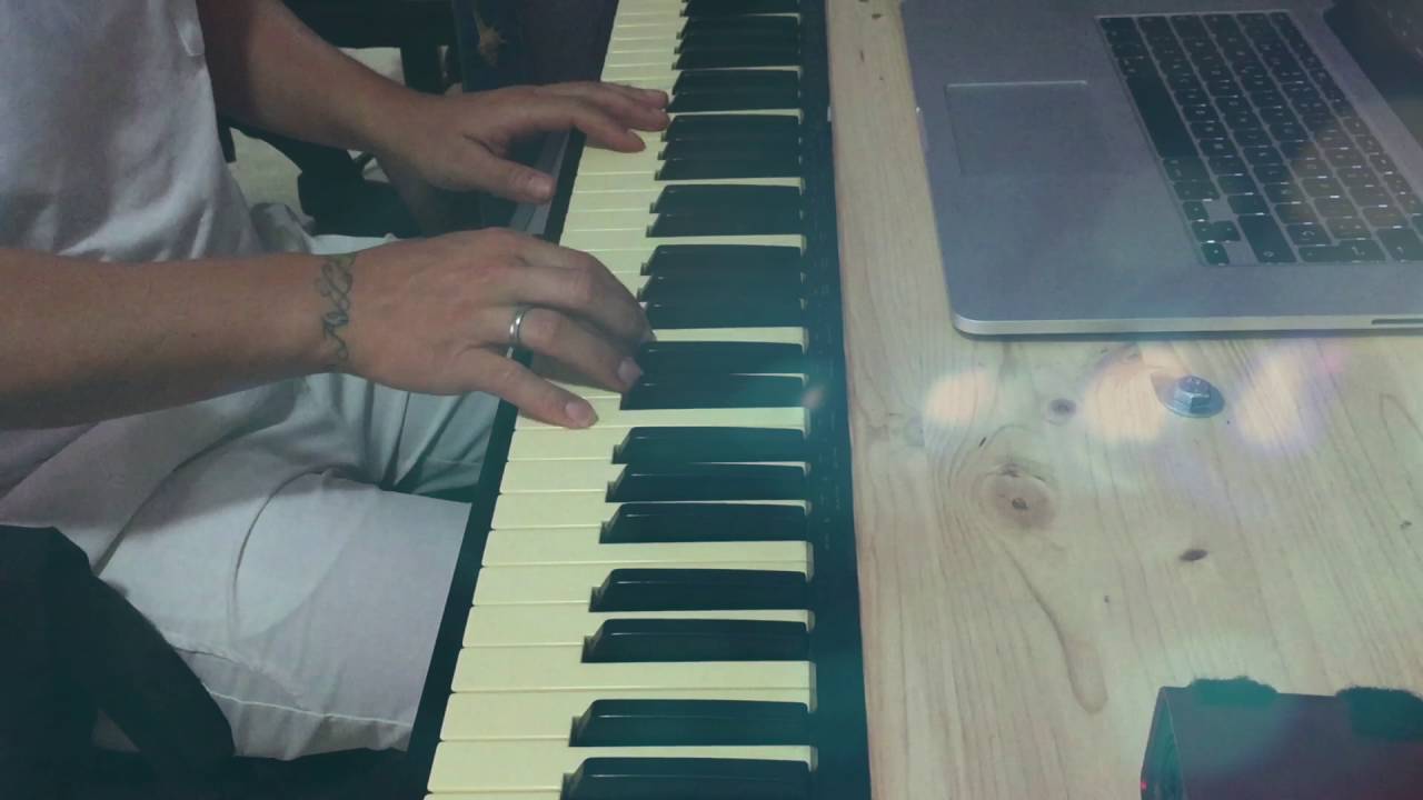 Juraj playing piano Running - YouTube