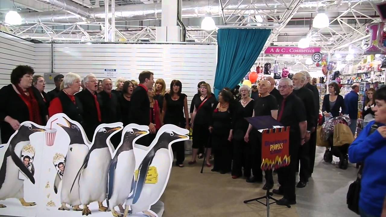 Blackburn People's Choir sing in the new Blackburn Market - YouTube