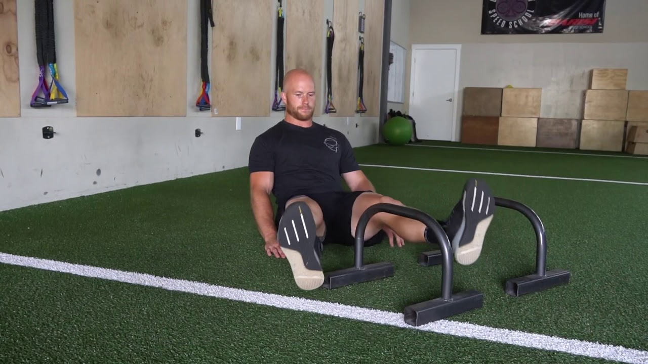 Seated single leg raise overs (parallettes) - YouTube