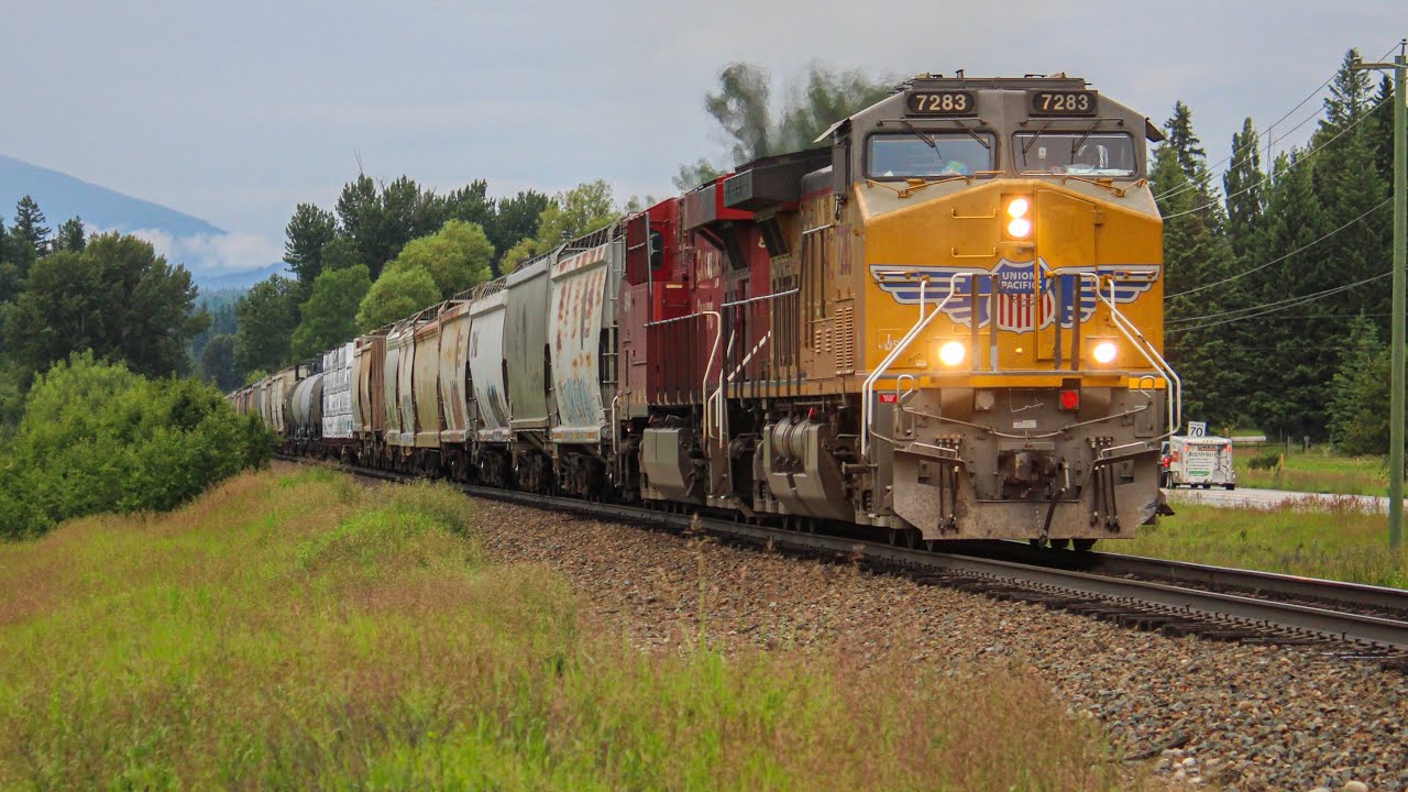 UP 7283 East - CPKC 318 (Grain) - CP Cranbrook Sub - Jaffray, British Columbia - YouTube