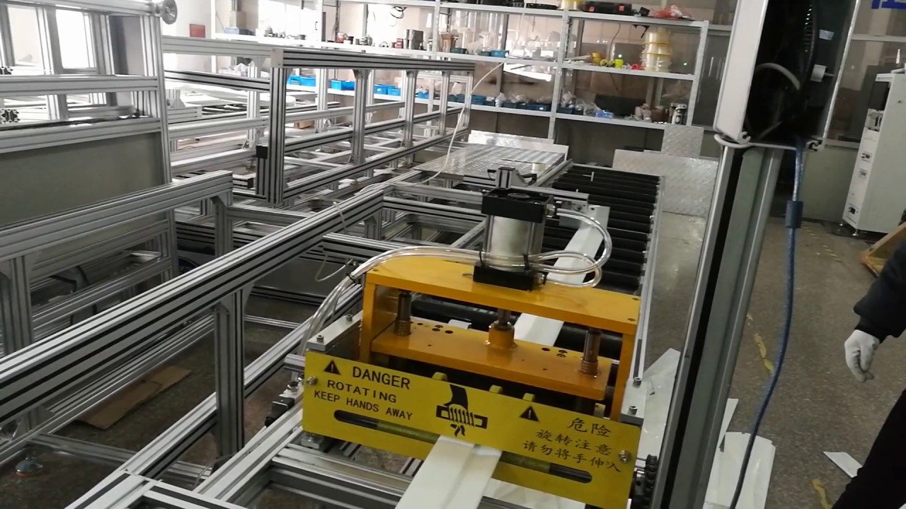 Double layer mylar forming machine for busdust wrapping - YouTube
