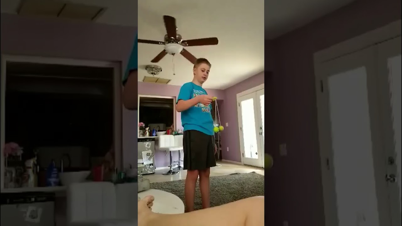 Kid destroys arm with clackers - YouTube