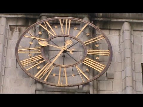 Monastery building with massive clock and glockenspiel chime - YouTube