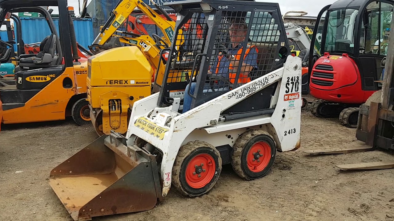 Bobcat working - YouTube