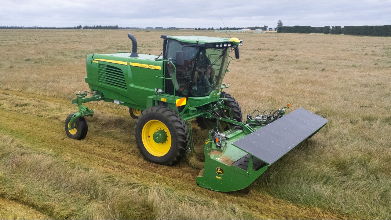 John Deere W260 Windrowing Grass Seed - YouTube