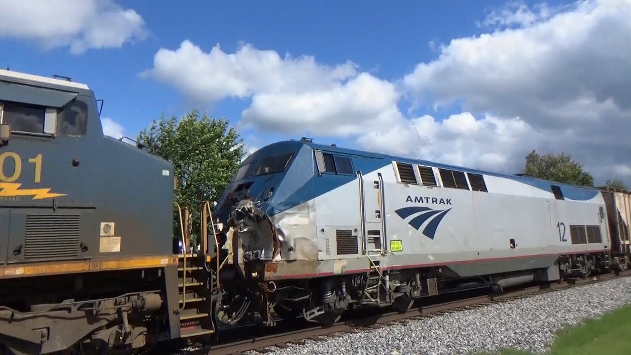 Damaged Amtrak P42DC Trails as CSX ES44AH 3075 Leading Q648-21 on 9/22 ...