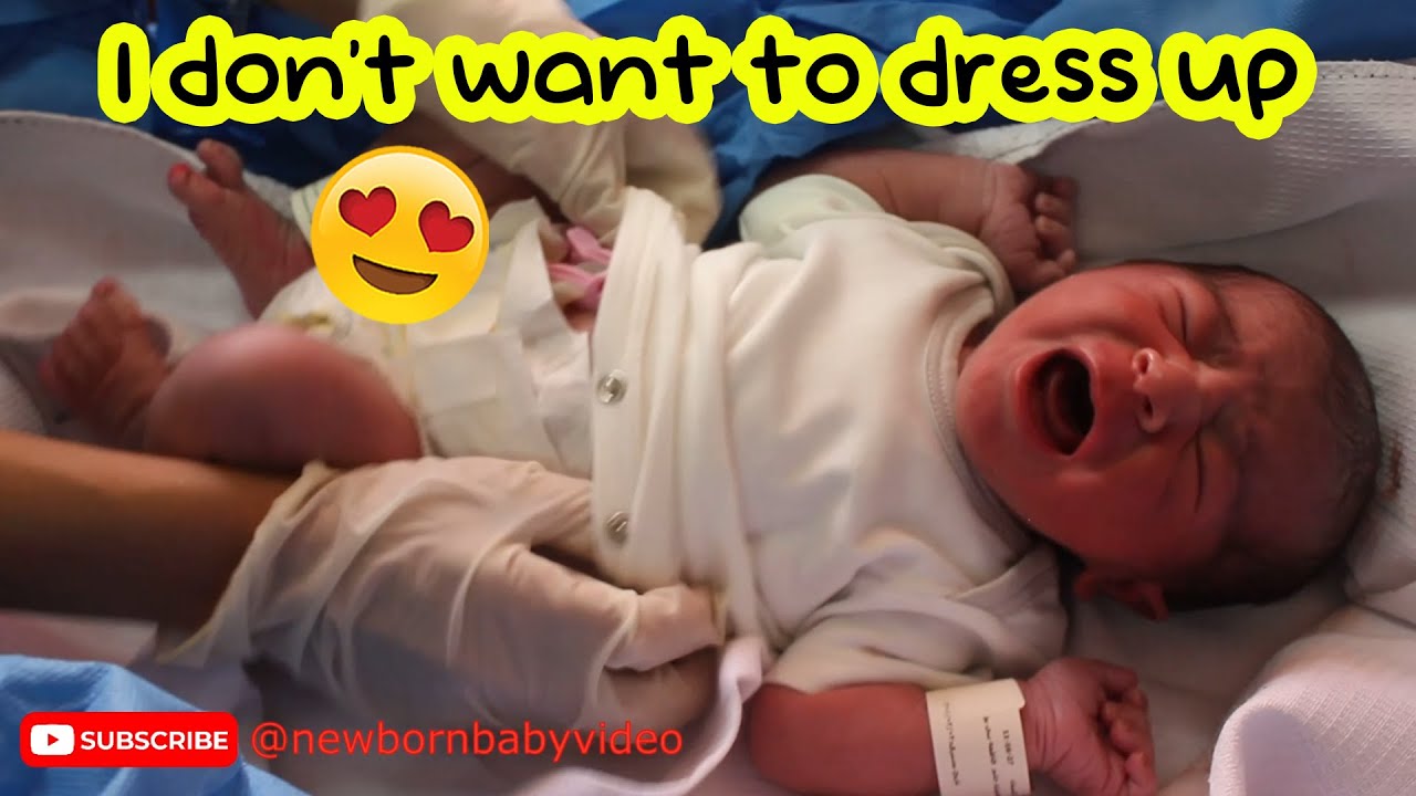Lovely newborn baby wearing clothes for the first time after birth 😍 # ...
