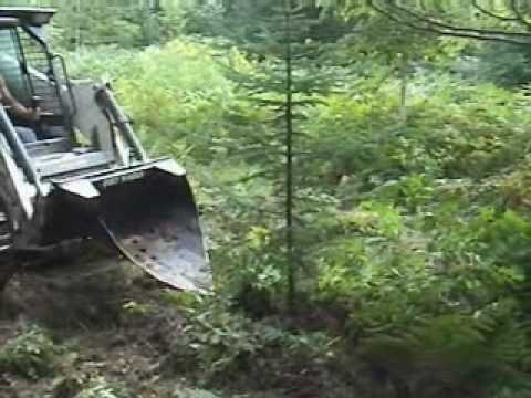 DIRT WORKS Skid Steer Mount Tree Shovel - YouTube