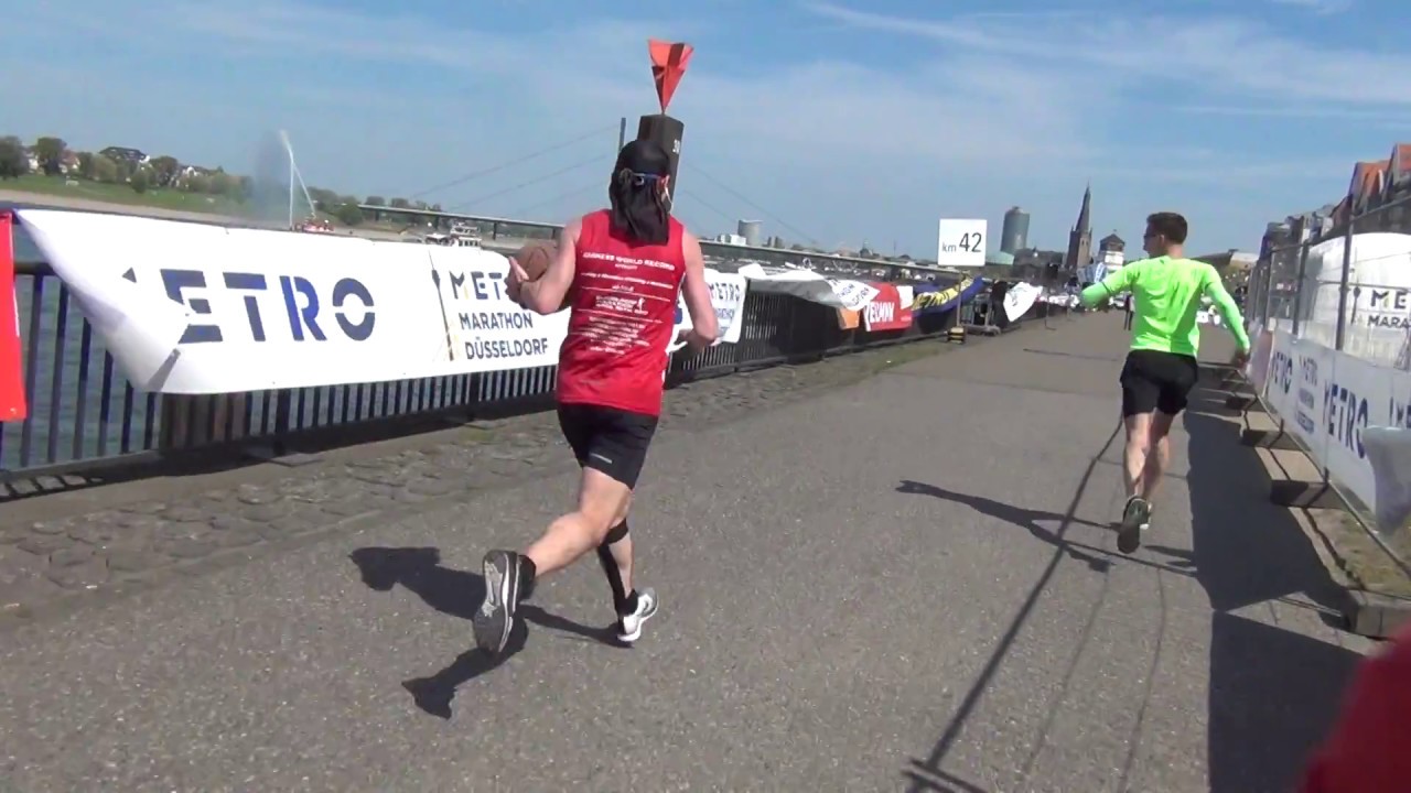 Fastest Marathon dribbling a Basketball - World Record in 3:00:25 - in ...
