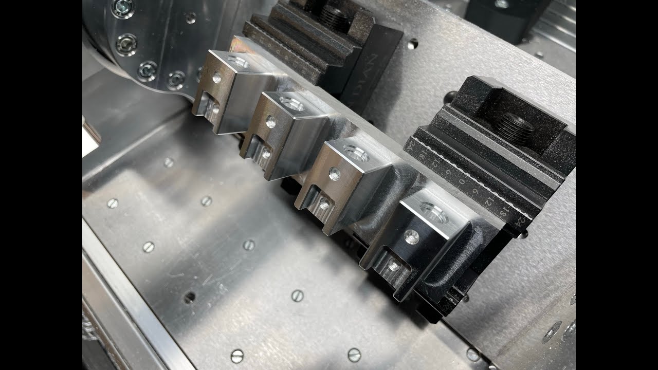 4-Axis-CNC machining some aluminium fuse holder parts - YouTube