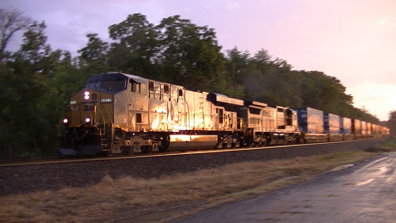 6/20/14 CSXT 5220 leads NS 223 in the rain - YouTube