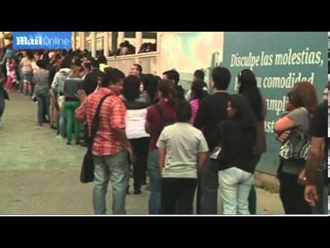 Mourners attend the wake of a Venezuelan beauty Queen