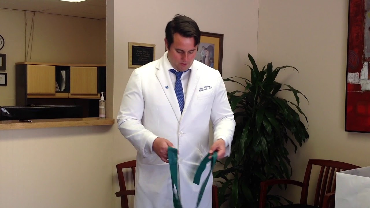 How To Do Bicep Hammer Curls At Home Using A Theraband Shown By Newton ...