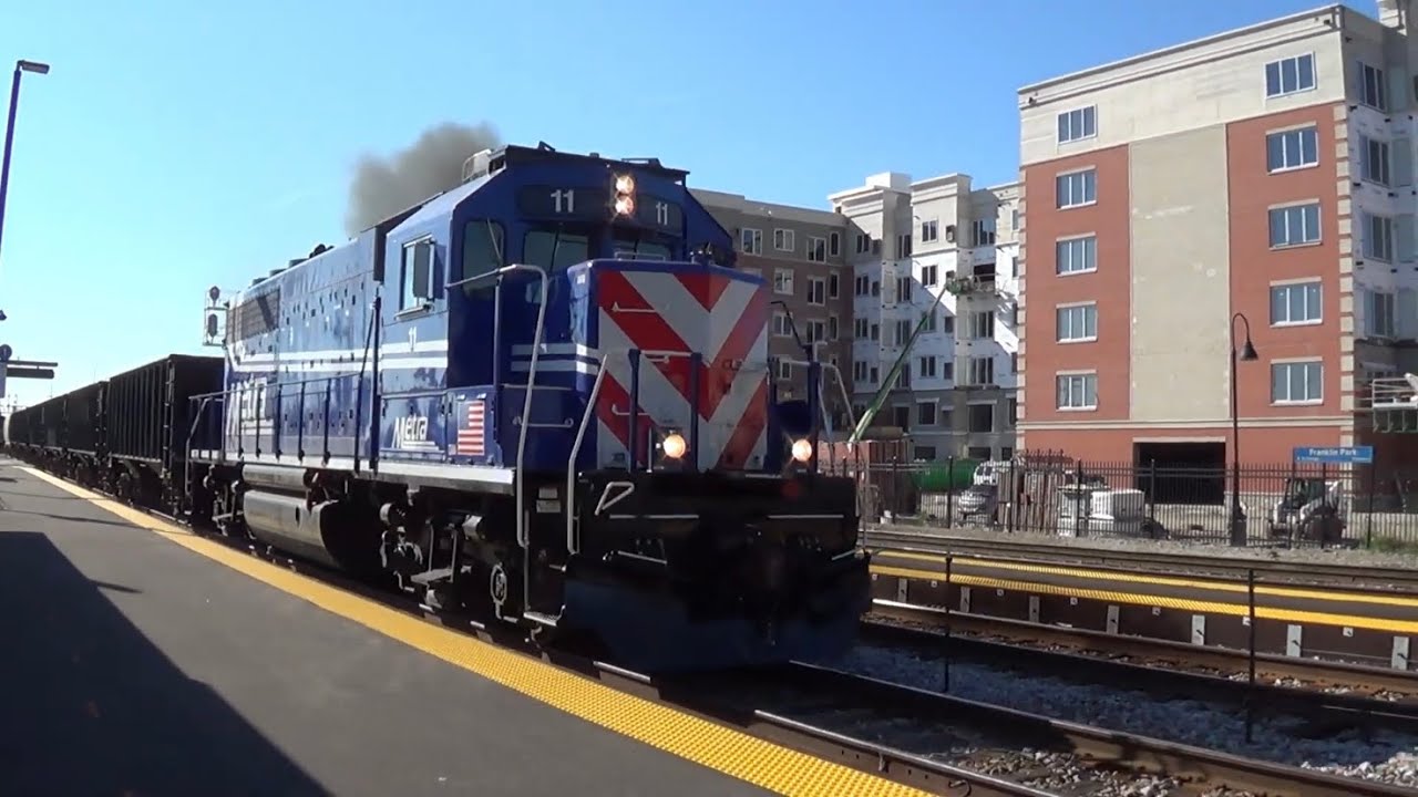 Metra 11 GP23ECO leads ballast train at Franklin Park - YouTube