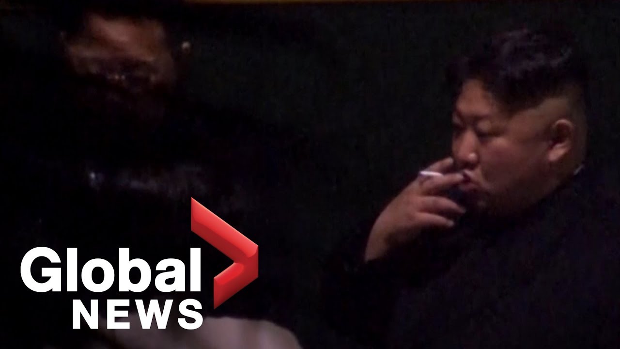 Kim Jong Un seen smoking cigarette during trip to Vietnam - YouTube
