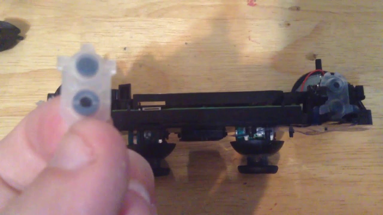 How to repair the L2/R2 bumper grommets inside a DS4 controller - YouTube