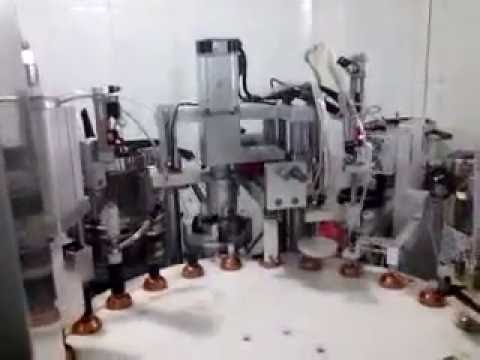 Automatic nail polish filling machine working video - YouTube