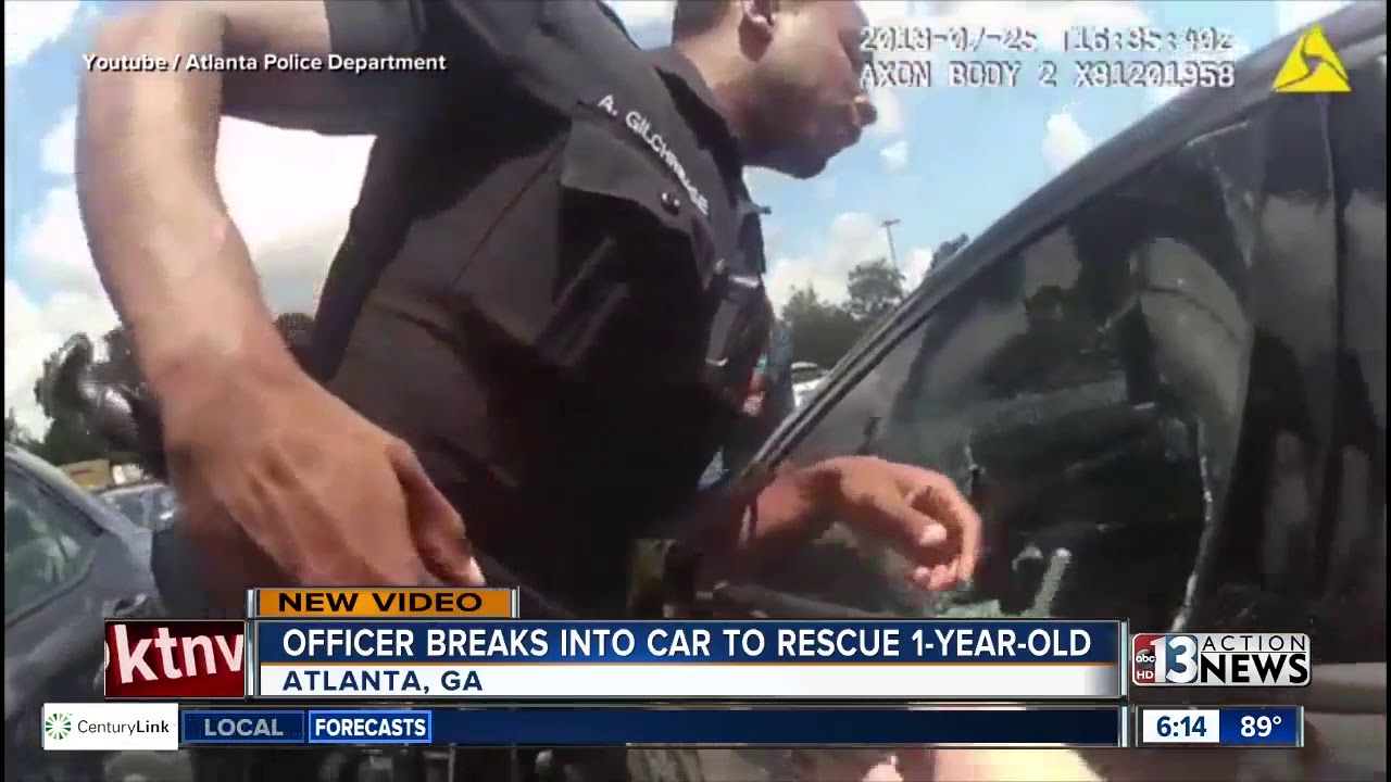 Atlanta police officer breaks window to reach child - YouTube