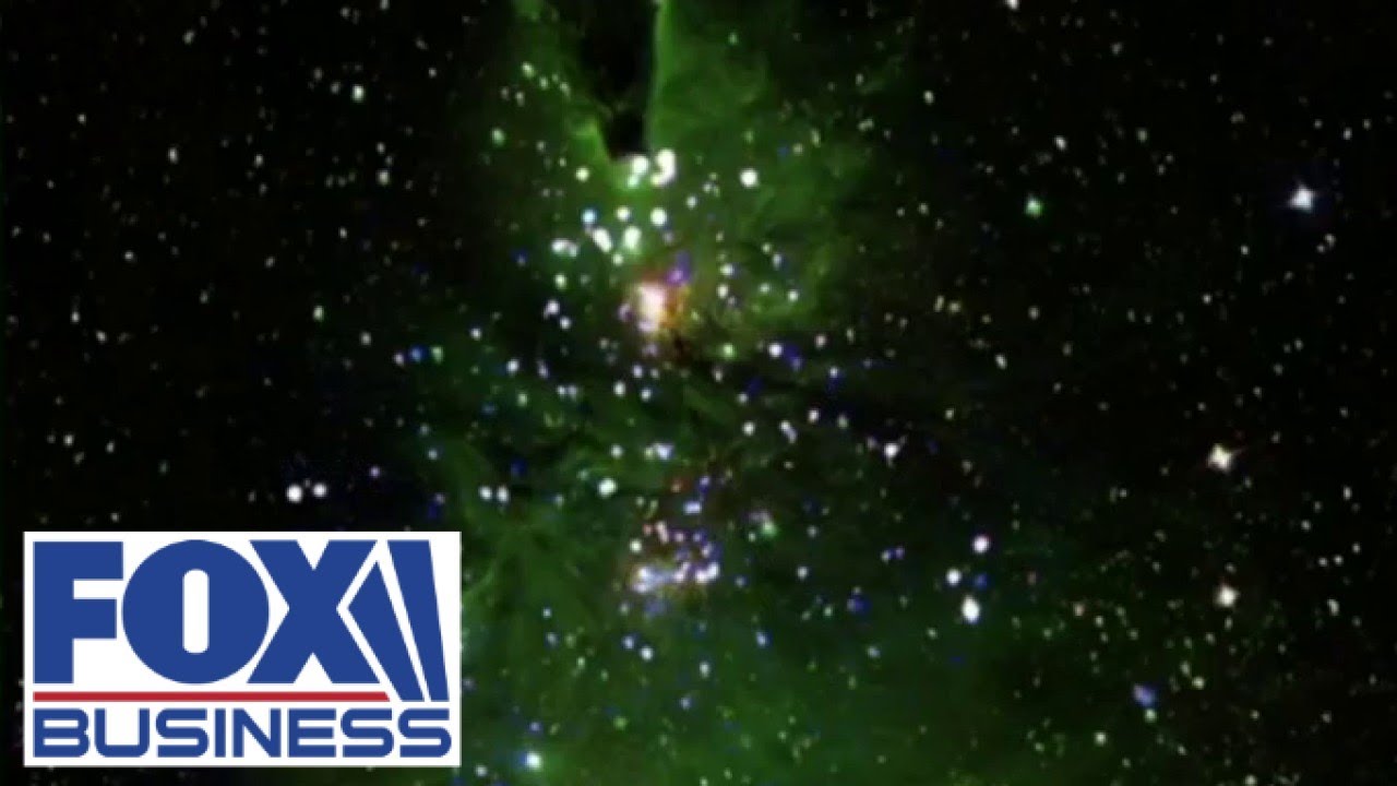 NASA shows off photo of 'Christmas Tree Cluster' - YouTube