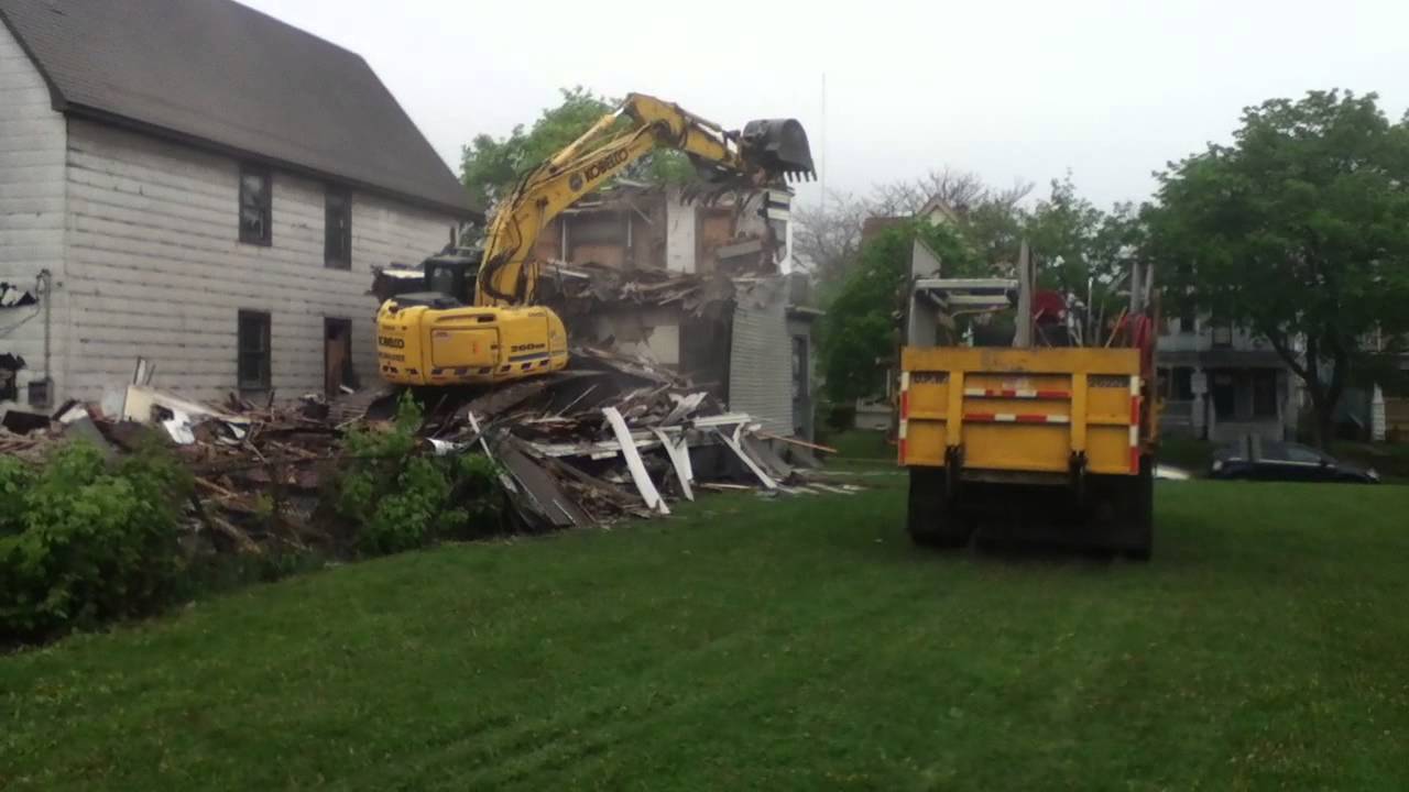 City of Milwaukee Kubota excavator demolition of a house - YouTube