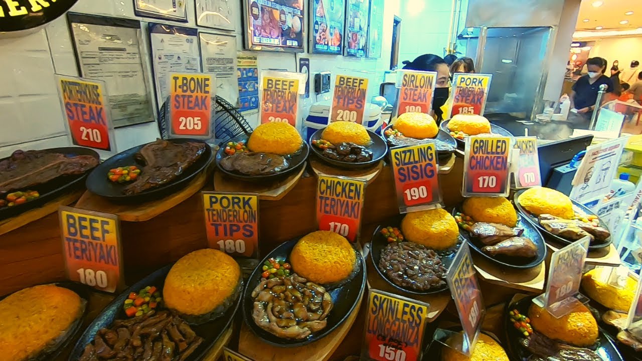 Filipino Sizzling Steaks Sisig Chicken and Pasta at Filipino Fast Food ...