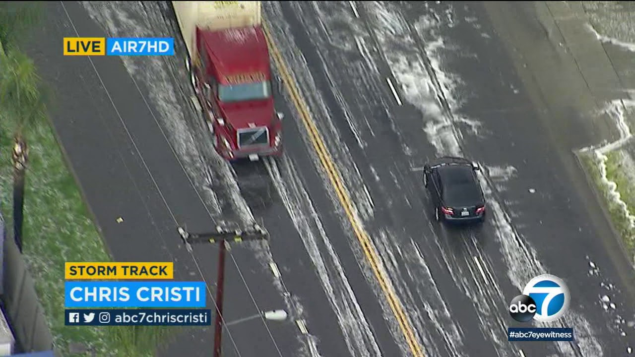 SoCal storm shuts down 710 Fwy, floods Compton streets | ABC7 - YouTube