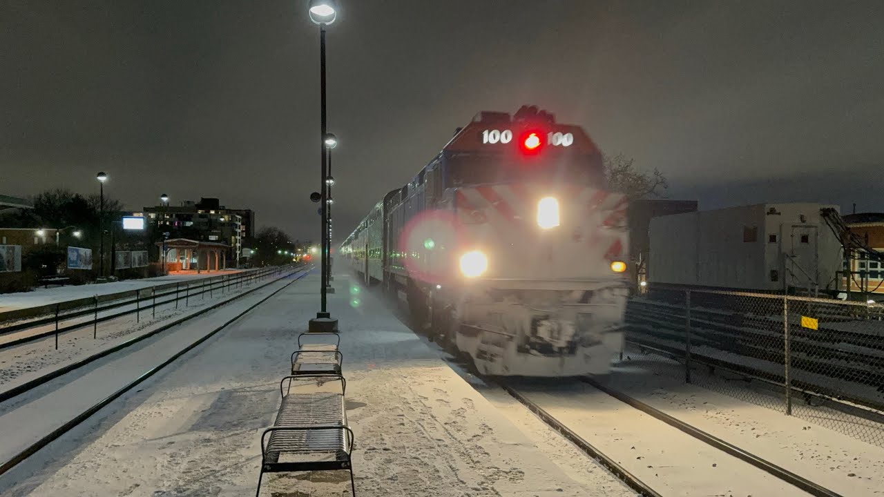Metx 100 hauls an outbound into oak park station with a red gyra light ...