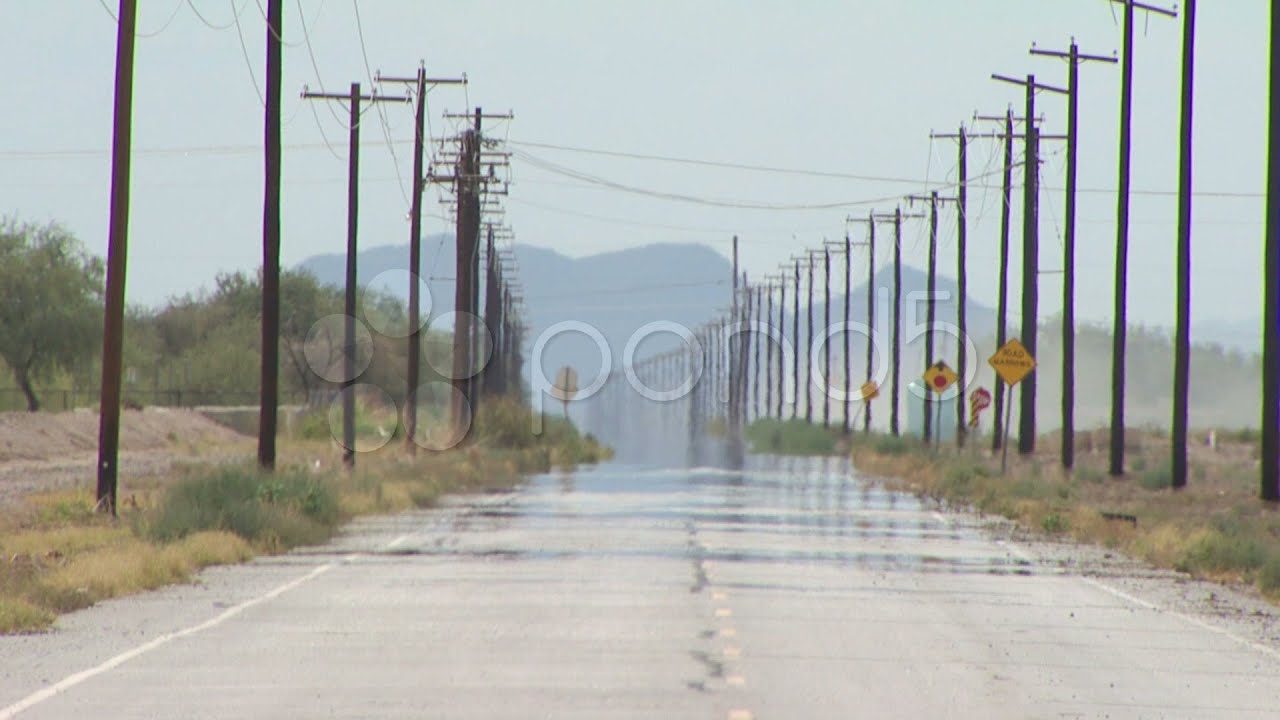 Long, deserted road with extreme heat haze, mirage. Stock Footage - YouTube