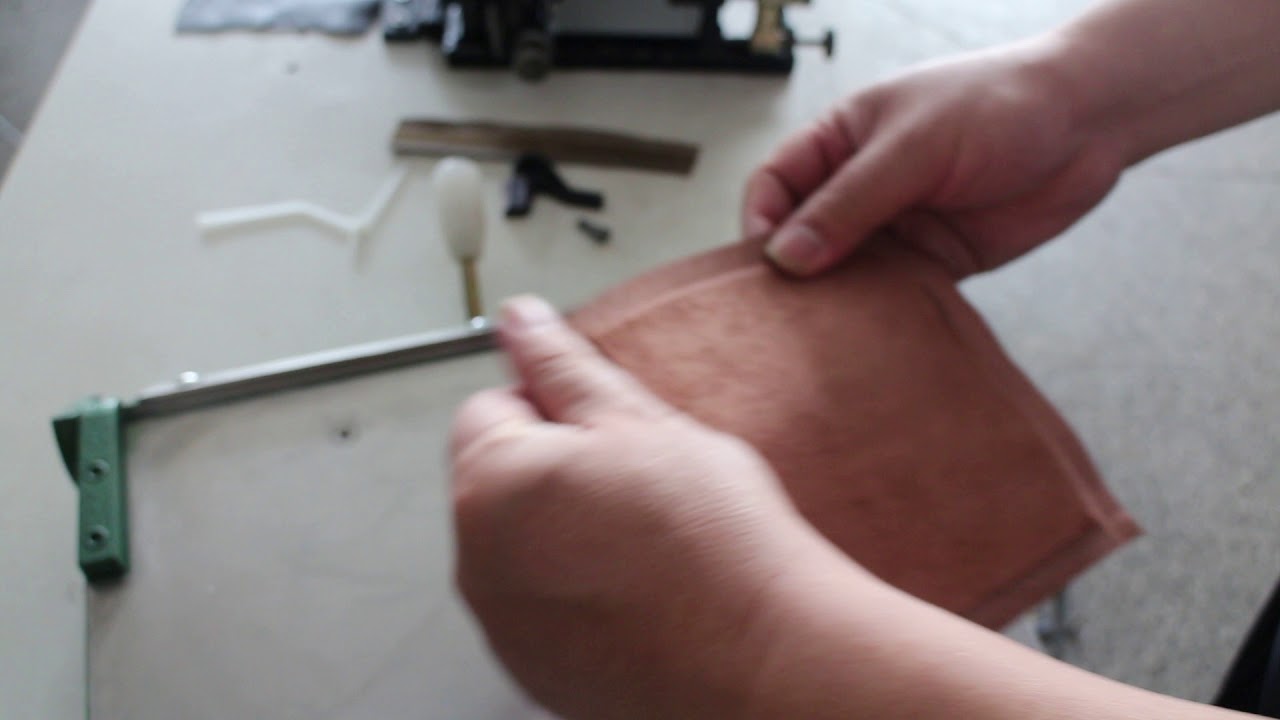 Manual folding machine for leather wallet purse - YouTube