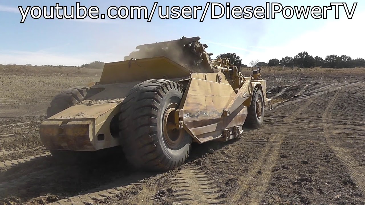 CAT 623 SCRAPER TANK CLEANING - YouTube