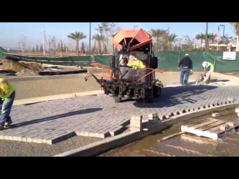 Machine lay permeable pavers. - YouTube