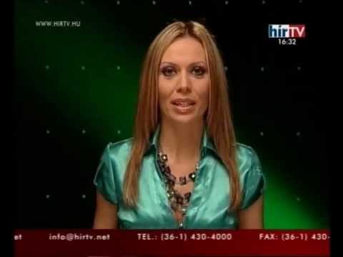 Show Presenter in Satin Blouse