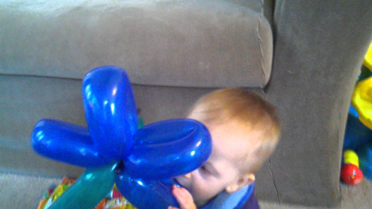 Julia plays with a squeaky balloon! - YouTube