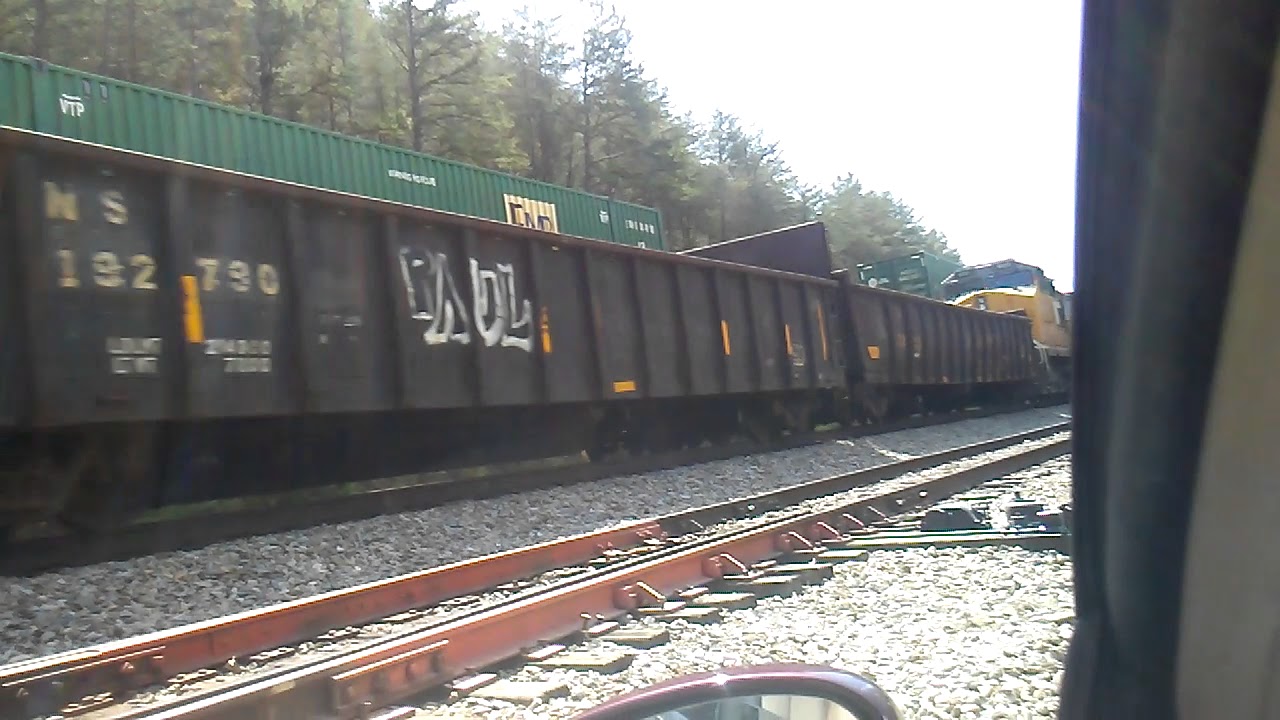 Caught off guard. Sb? Roars by NS 7650, CN 2801 & UP 9610. North waters ...