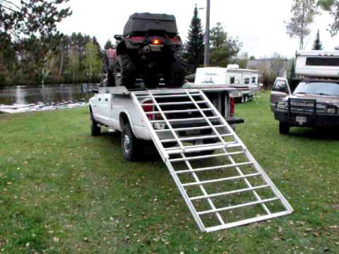 Loading ATV on a Marathon truck deck - YouTube