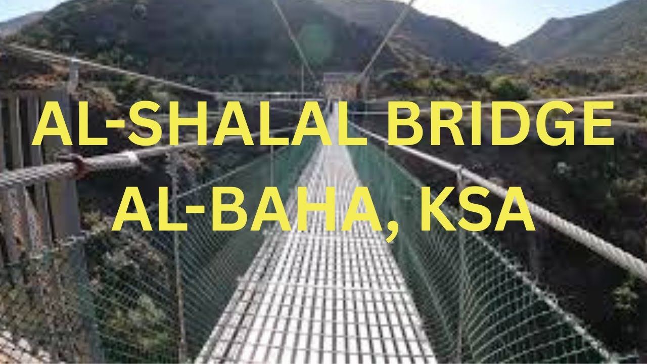 Crossing the Al-Shalal Bridge in Wadi Khaira Waterfall Park, Al-Baha ...