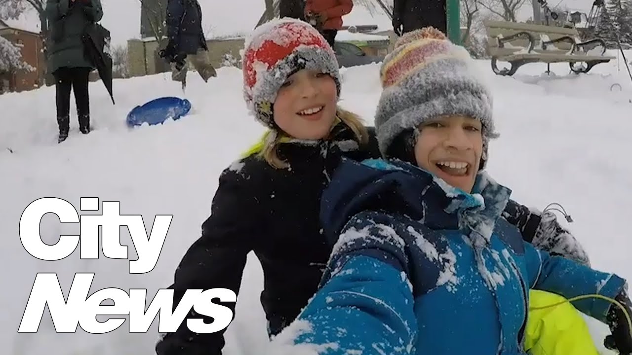 First snow day of the year has kids ditching school for the toboggan ...