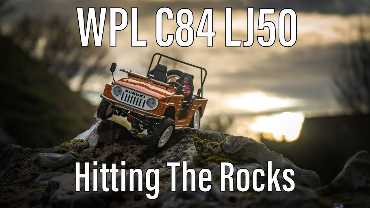 WPL C84 LJ50 Hitting The Rocks - YouTube