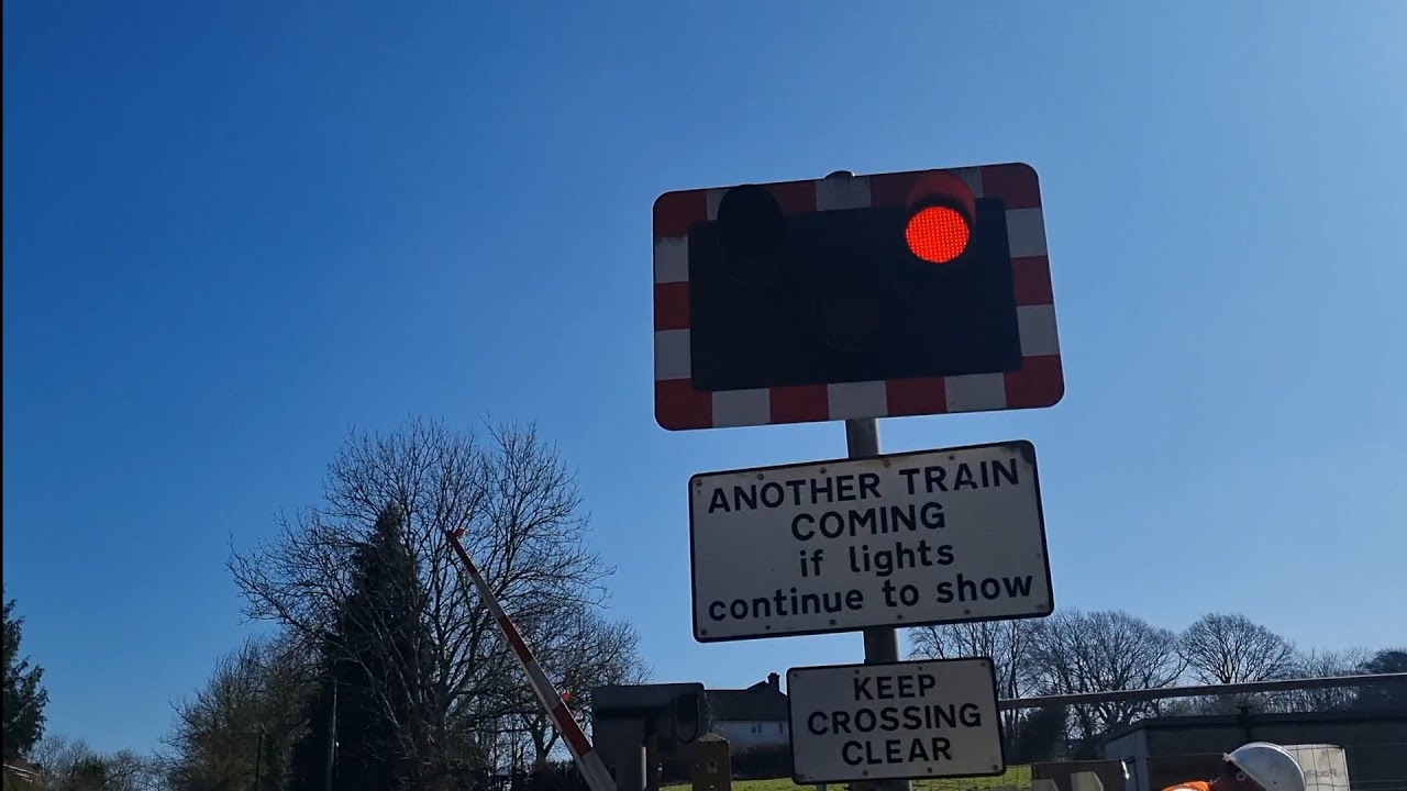 Sheet level crossing with workers doing the crossing upgrading the ...