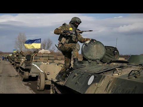 Both sides pull back heavy weapons in eastern Ukraine but mistrust ...