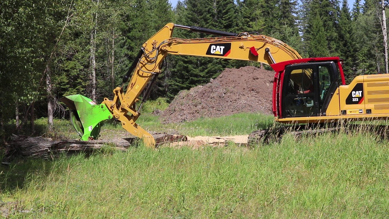 CAT 323 NG RDM52EX disc mulcher, mulch a fresh cottonwood like a hot ...