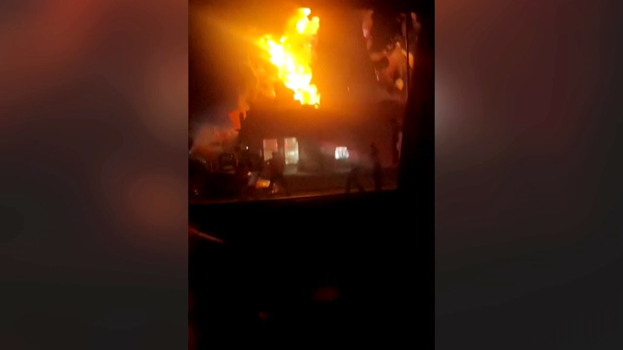 Explosion rips through Domino's restaurant after car crashes into ...