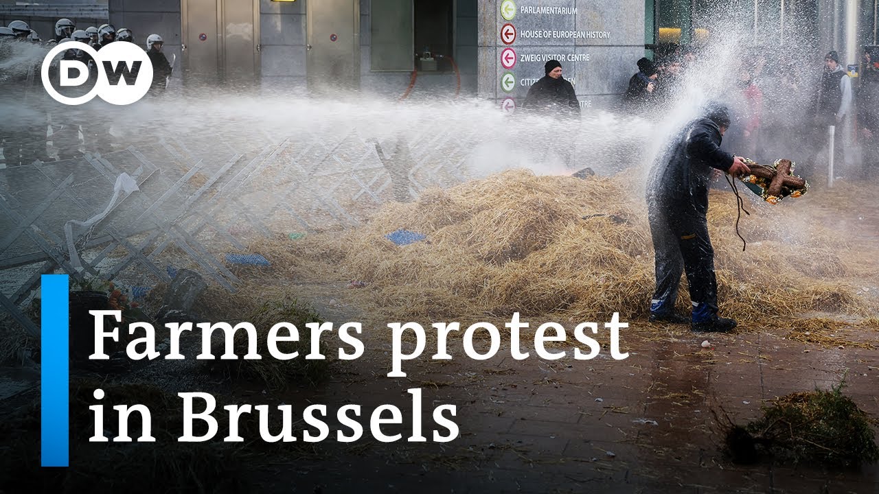 Farmers clash with police ahead of EU summit | DW News - YouTube