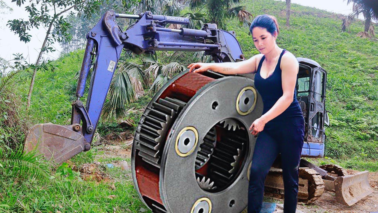 Mechanic Girl repairs and replace excavator moving motor assembly ...